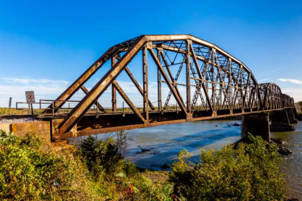 An Iconic Old Metal Truss Railroad Bridge over a Large River ...